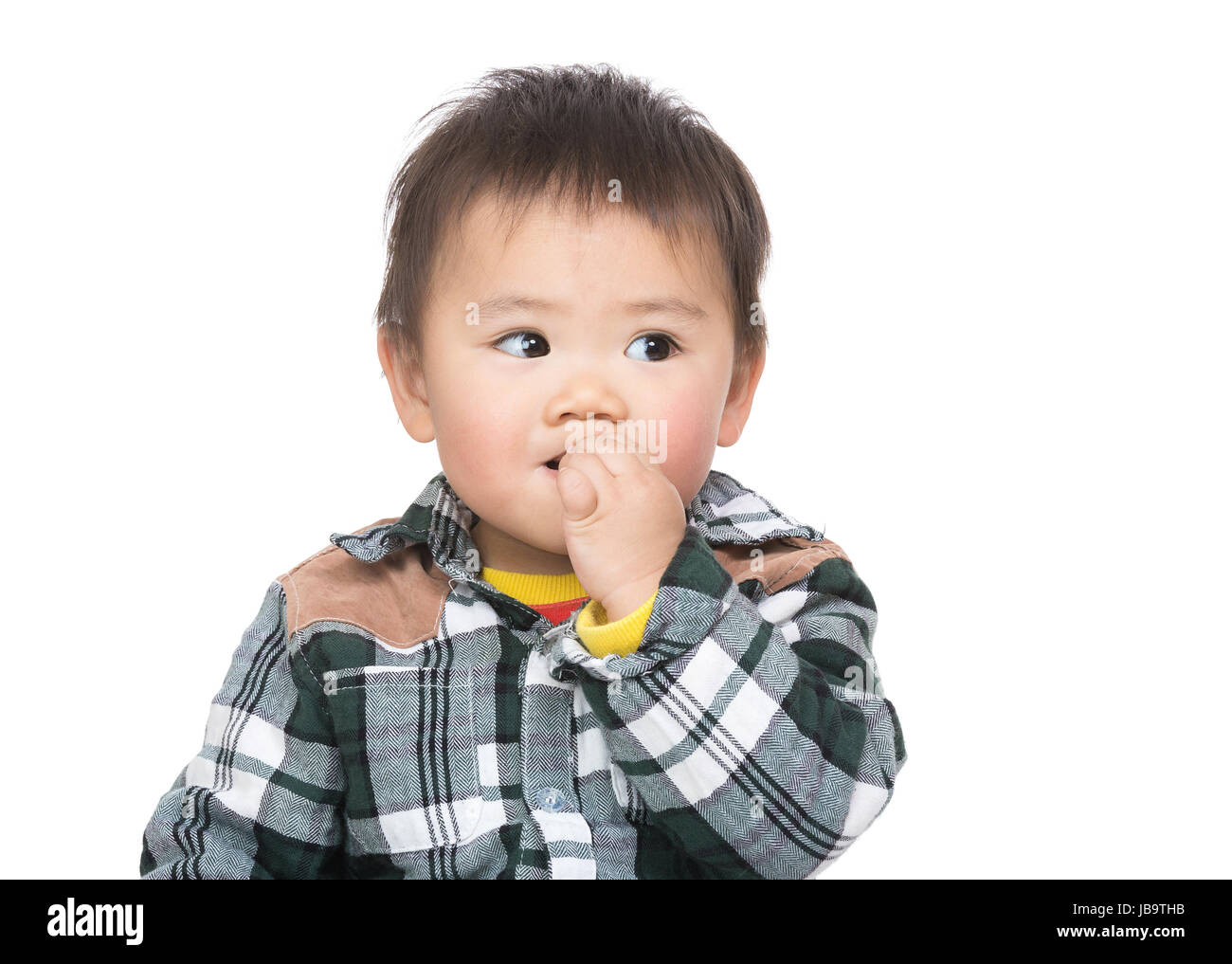 Asian baby boy suck finger into mouth Stock Photo - Alamy