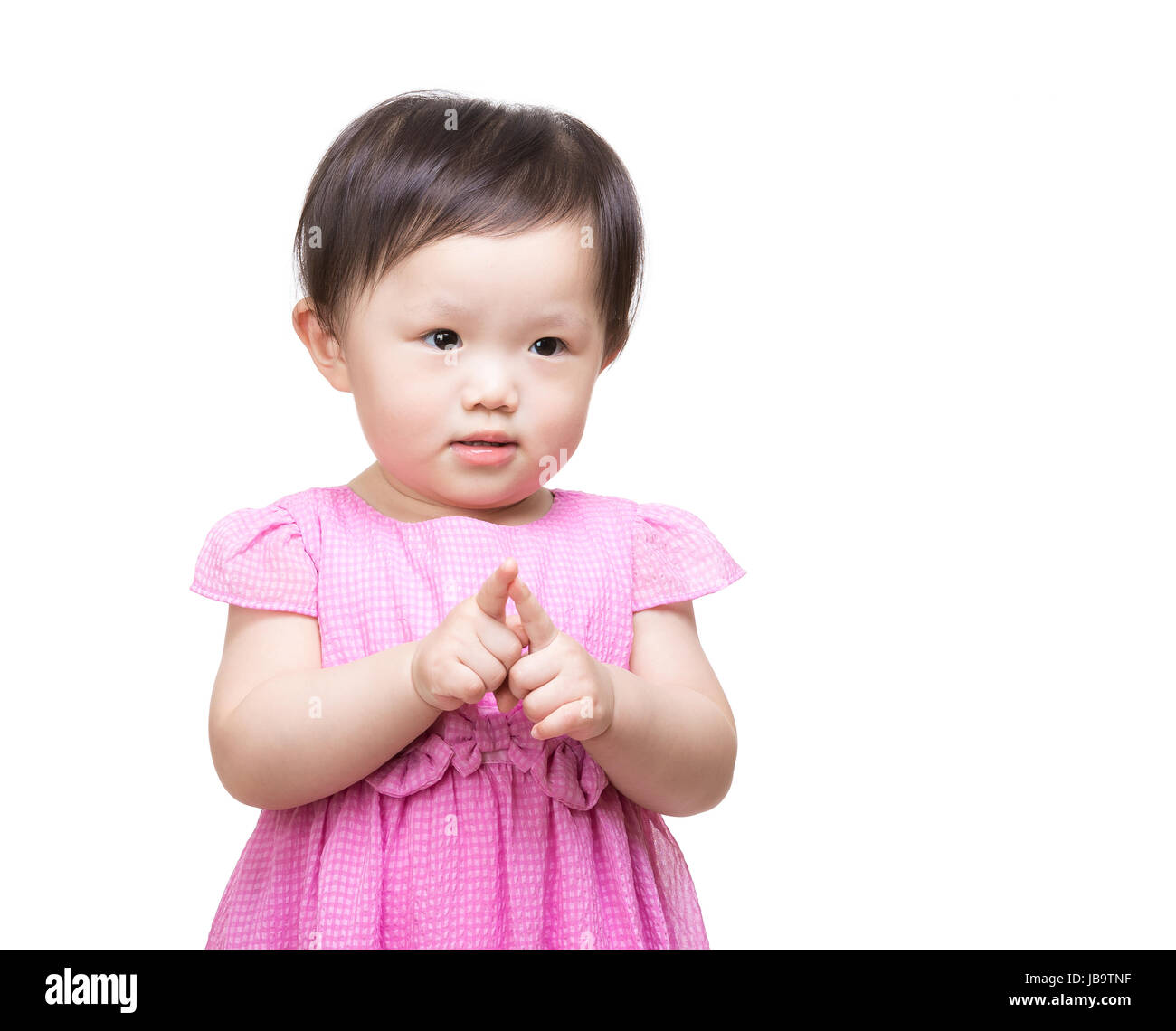 Asian baby girl finger touch together Stock Photo - Alamy