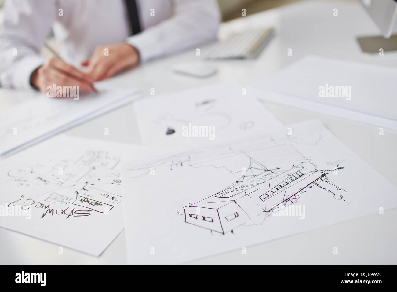 Image of sketches at workplace Stock Photo - Alamy
