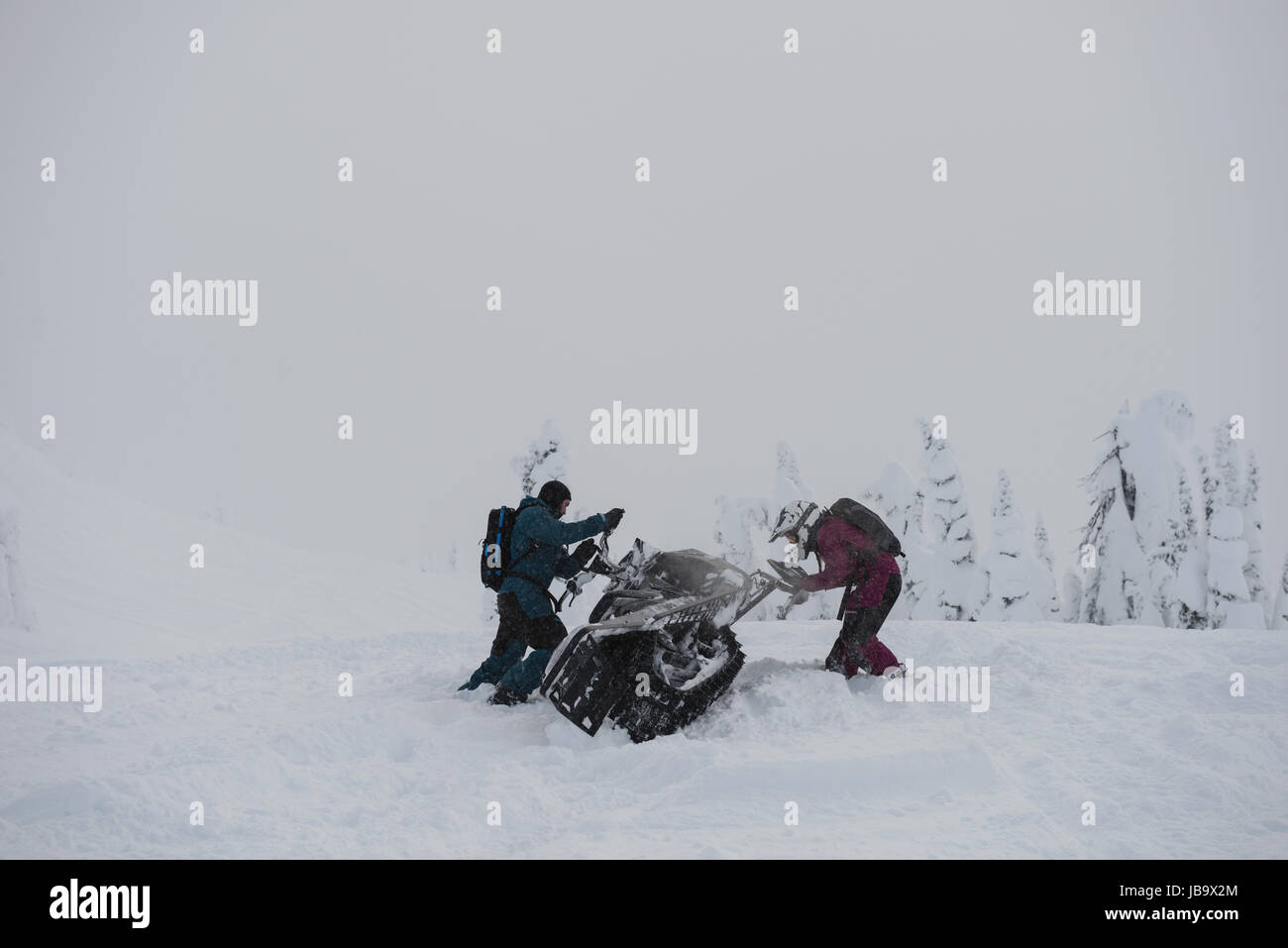Woman snowmobiler hi-res stock photography and images - Alamy