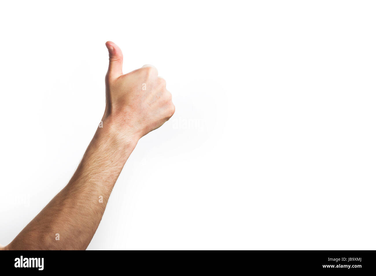 Man raising his big finger up, hand, on white background Stock Photo ...