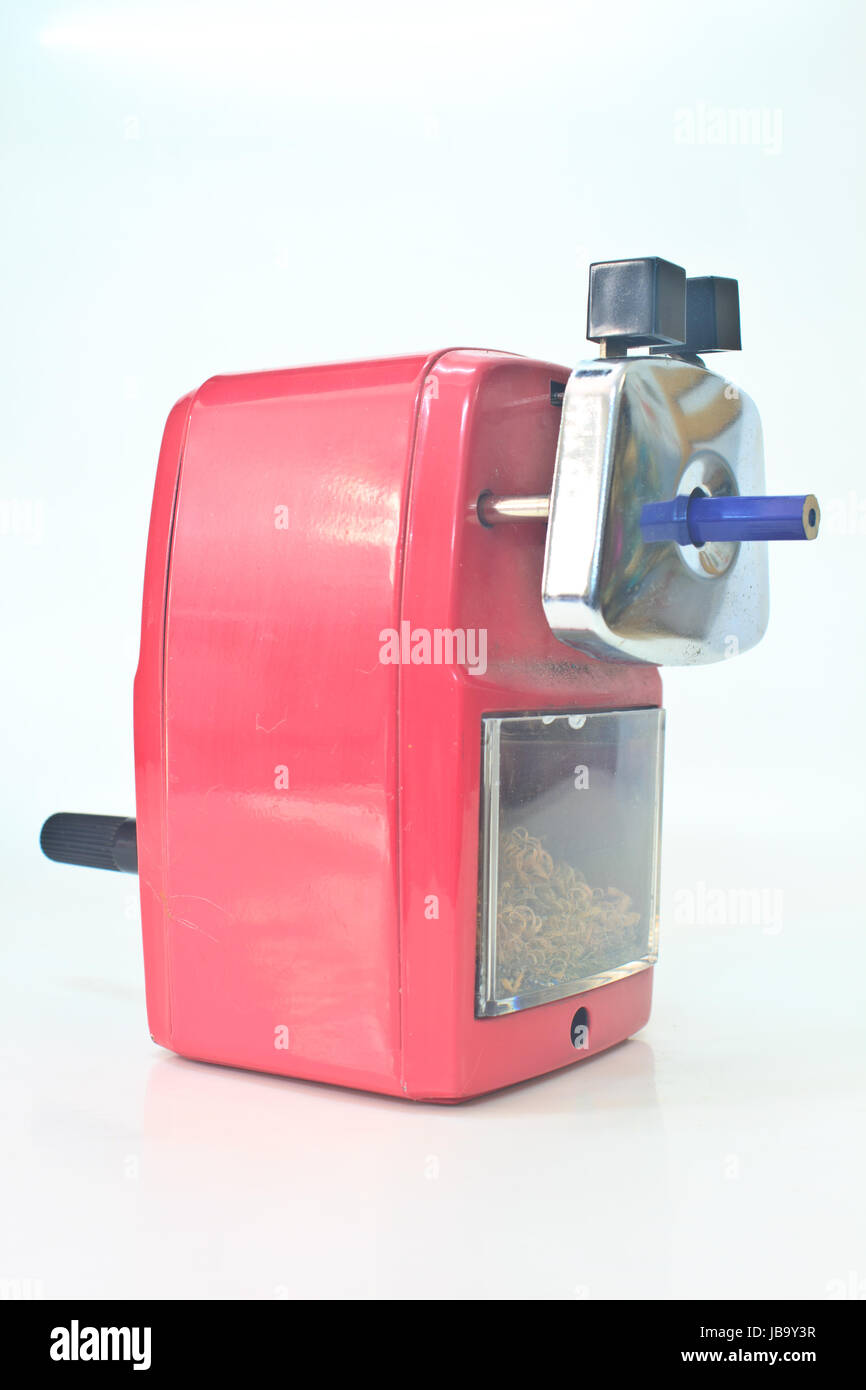 red pencil sharpener on white background Stock Photo - Alamy