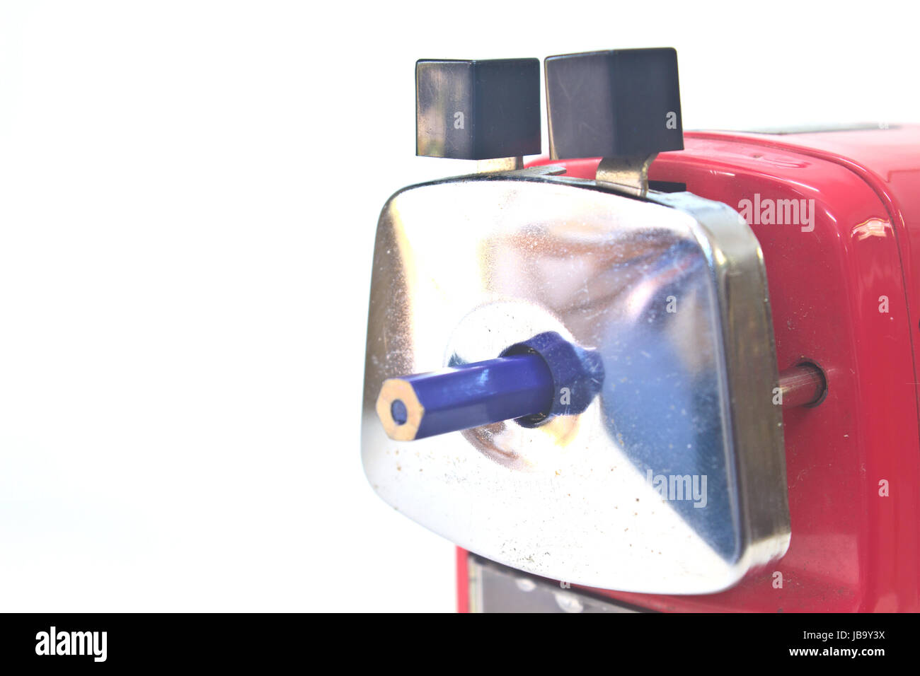 red pencil sharpener on white background Stock Photo - Alamy