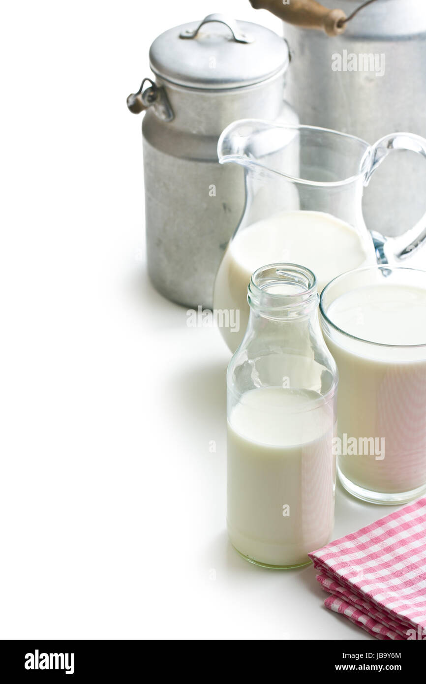 Various milk containers on white background Stock Photo - Alamy