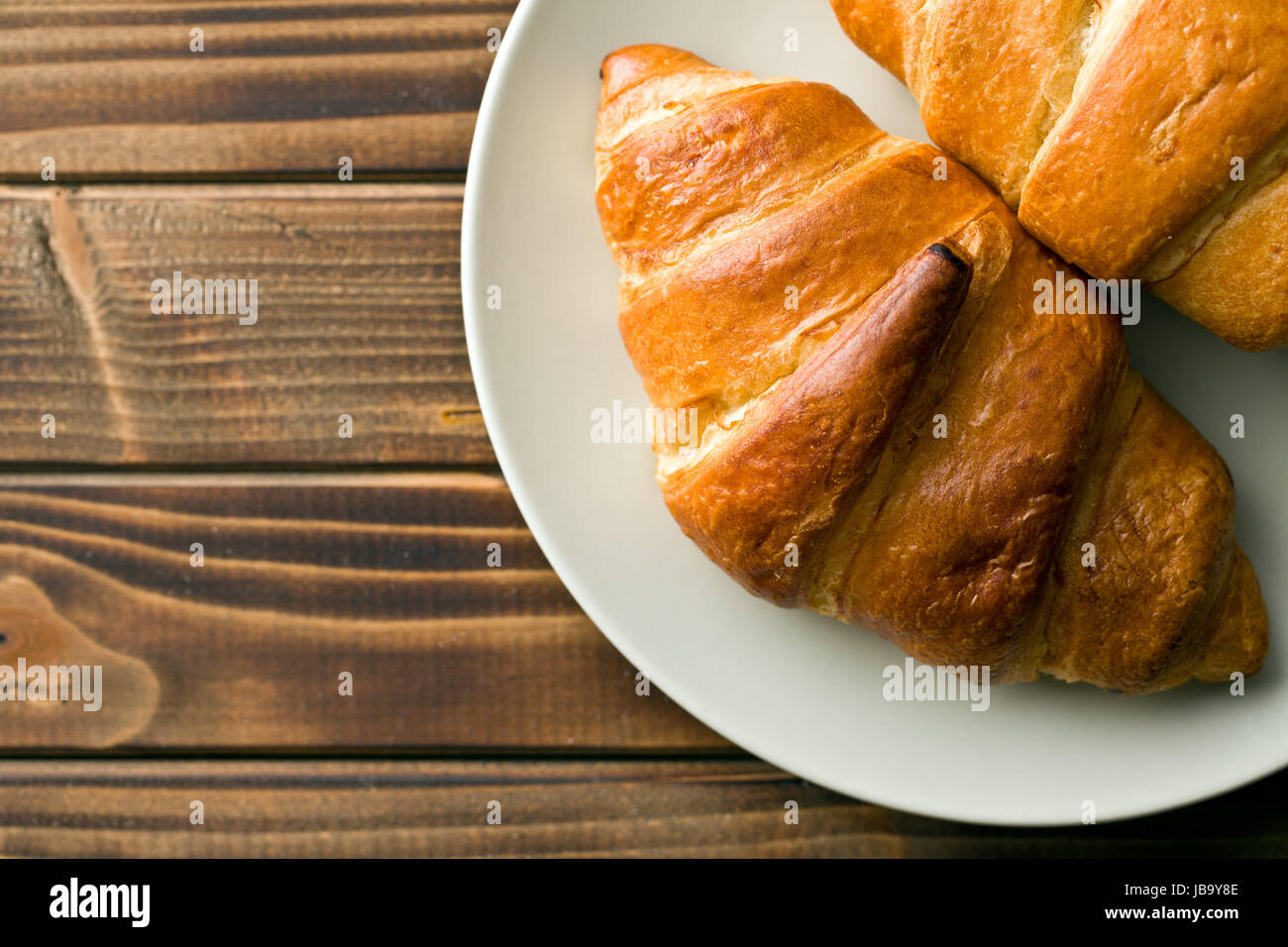 top view of croissants on plate Stock Photo - Alamy