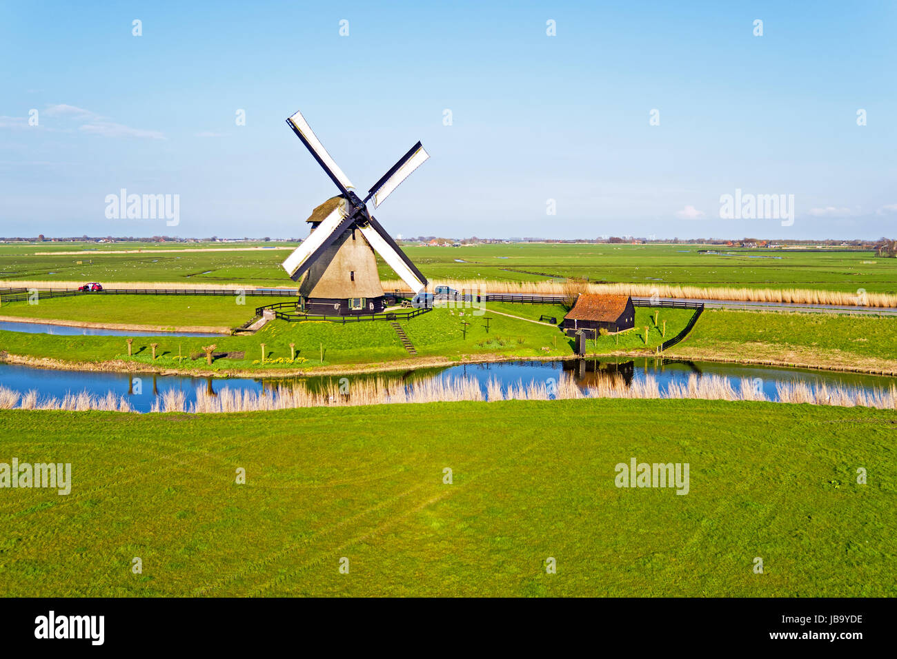 Aerial from a traditional ancient windmill in the countryside from the ...