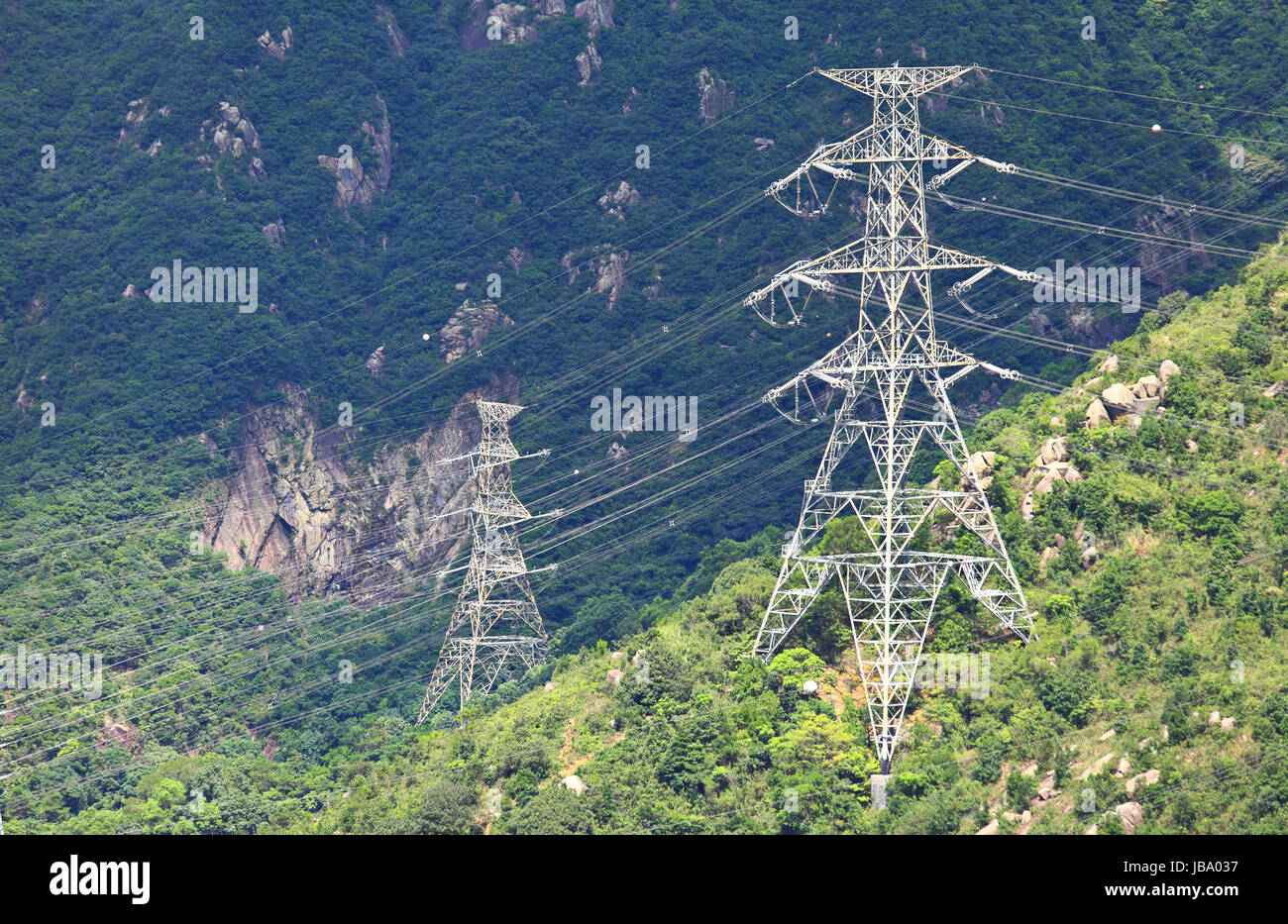 Powerline on mountain Stock Photo - Alamy