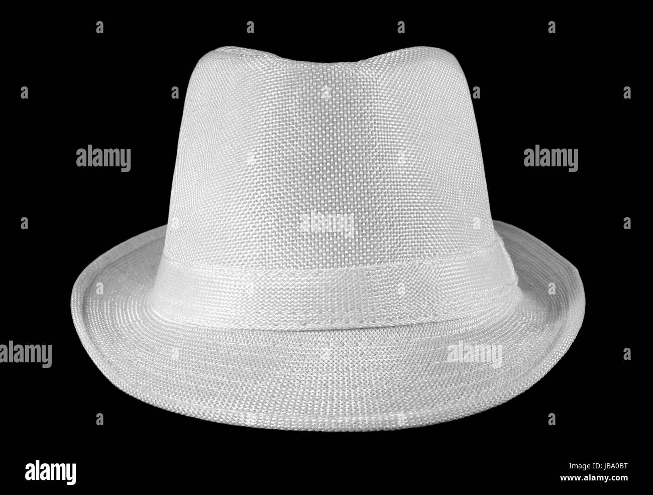 A white hat, isolated on black studio background Stock Photo - Alamy