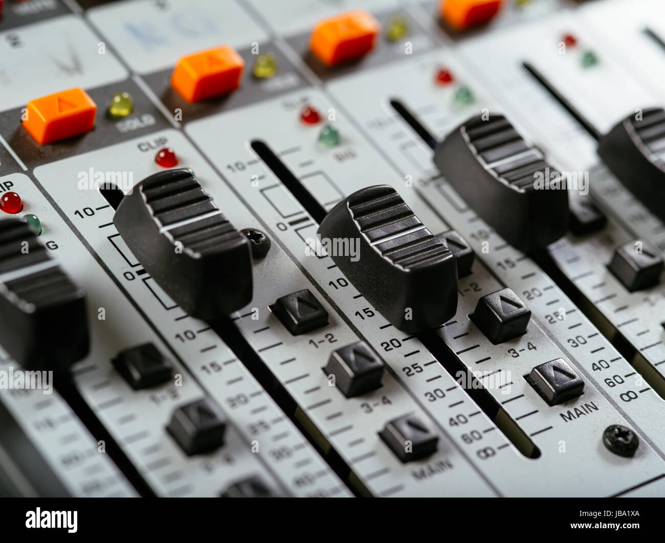 Macro photo of faders of a studio soundboard Stock Photo - Alamy