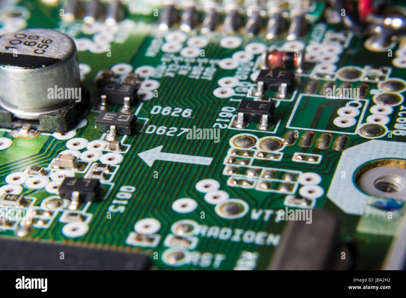 Green circuit board with micro chips hi-res stock photography and ...