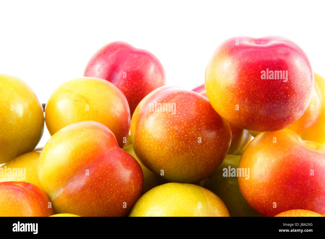 some delicious plum with pure white background Stock Photo - Alamy