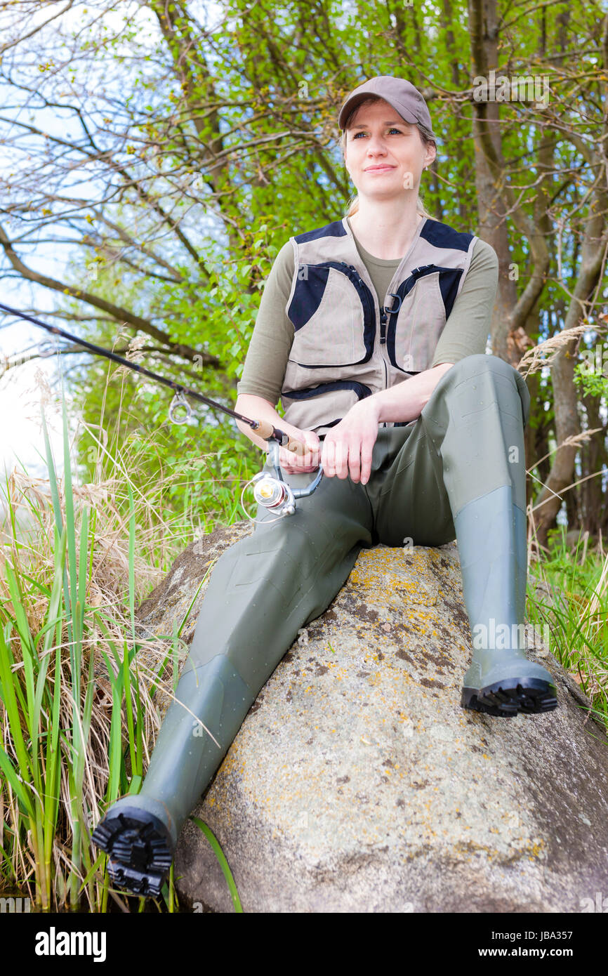 woman fishing in spring Stock Photo - Alamy