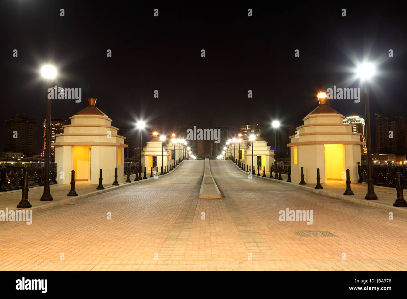 Bridge in Porto Arabia at night. Doha, Qatar, Middle East Stock Photo ...