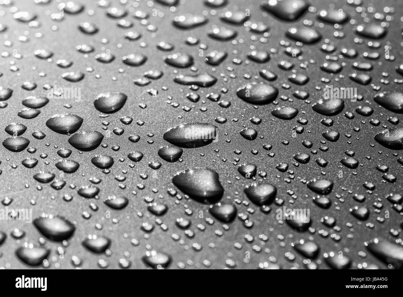 Gray water drops background Stock Photo - Alamy