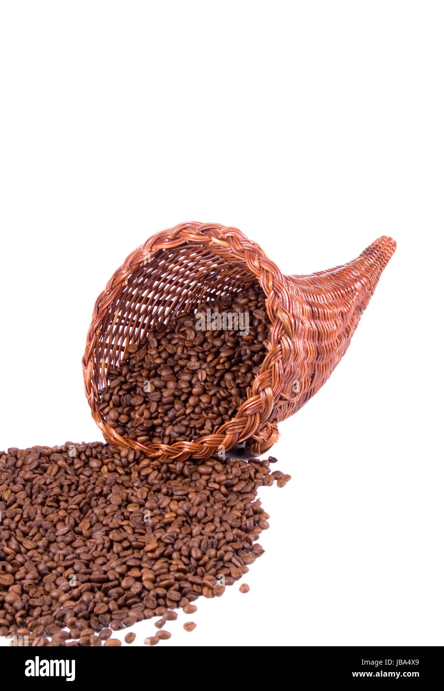 A wicker cornucopia filled with coffee beans Stock Photo - Alamy