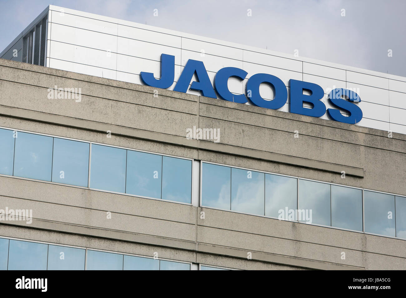 A logo sign outside of a facility occupied by Jacobs Engineering Group ...