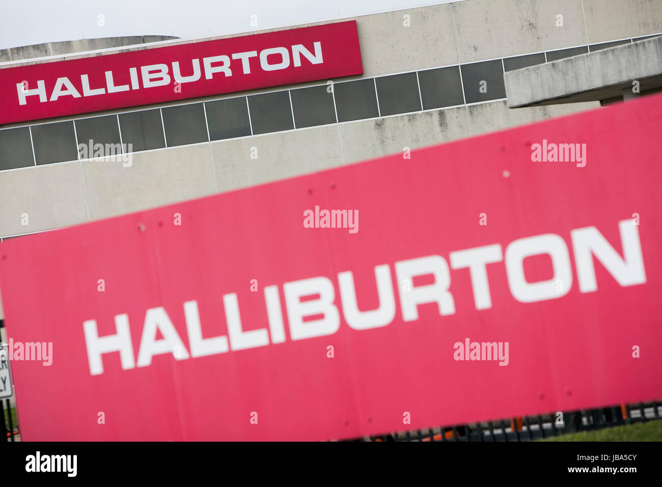 A logo sign outside of a facility occupied by The Halliburton Company ...