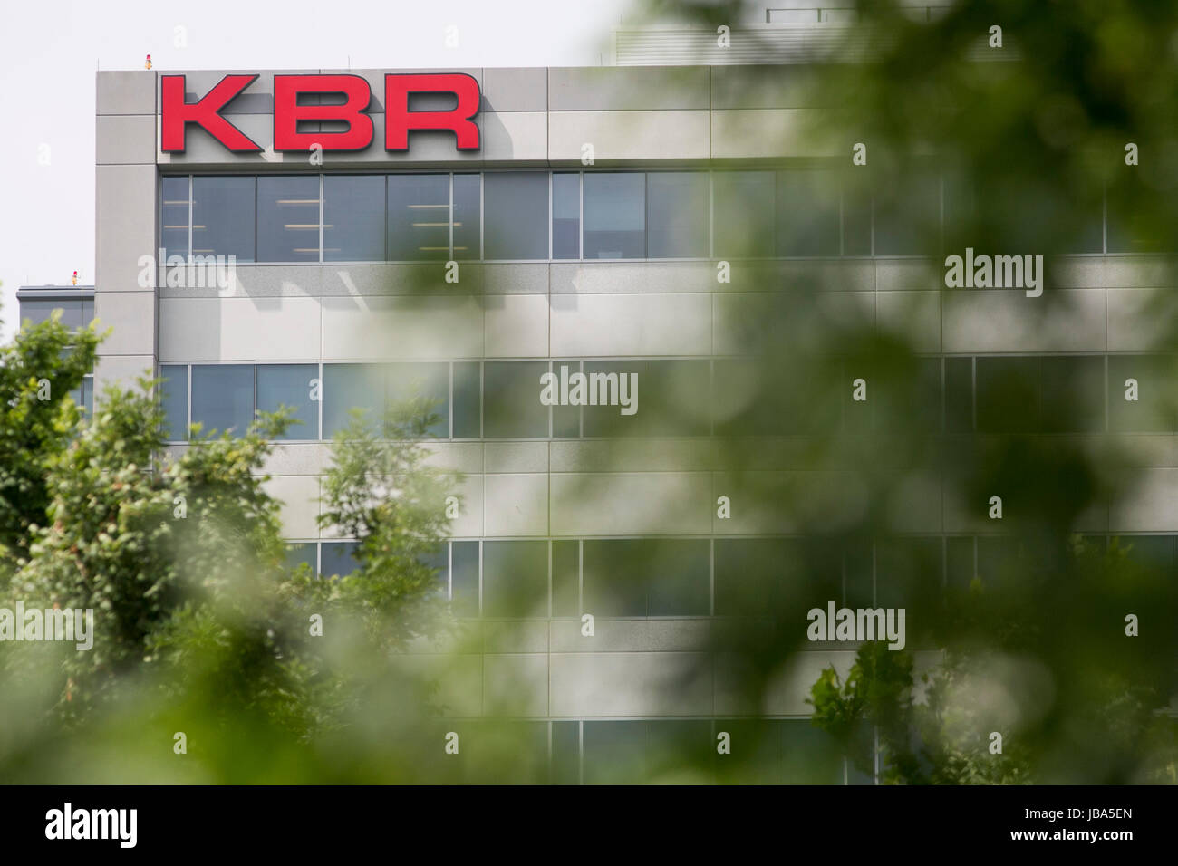 A logo sign outside of a facility occupied by KBR, Inc, in Houston ...