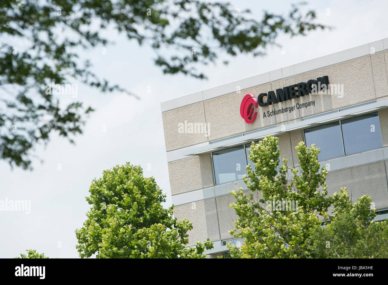 A logo sign outside of a facility occupied by the Cameron International ...