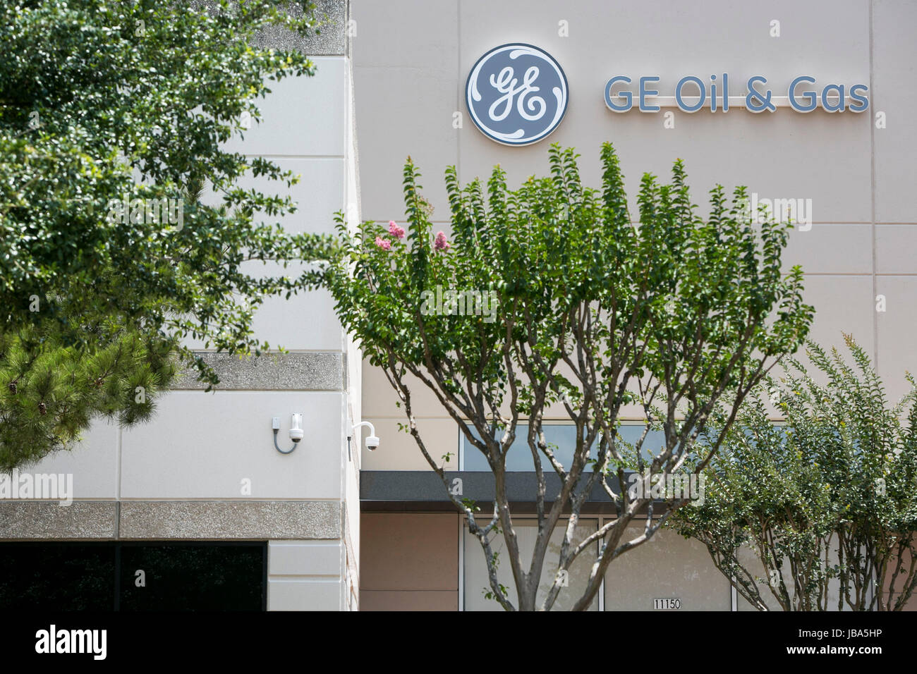 A logo sign outside of a facility occupied by GE Oil & Gas in Houston ...