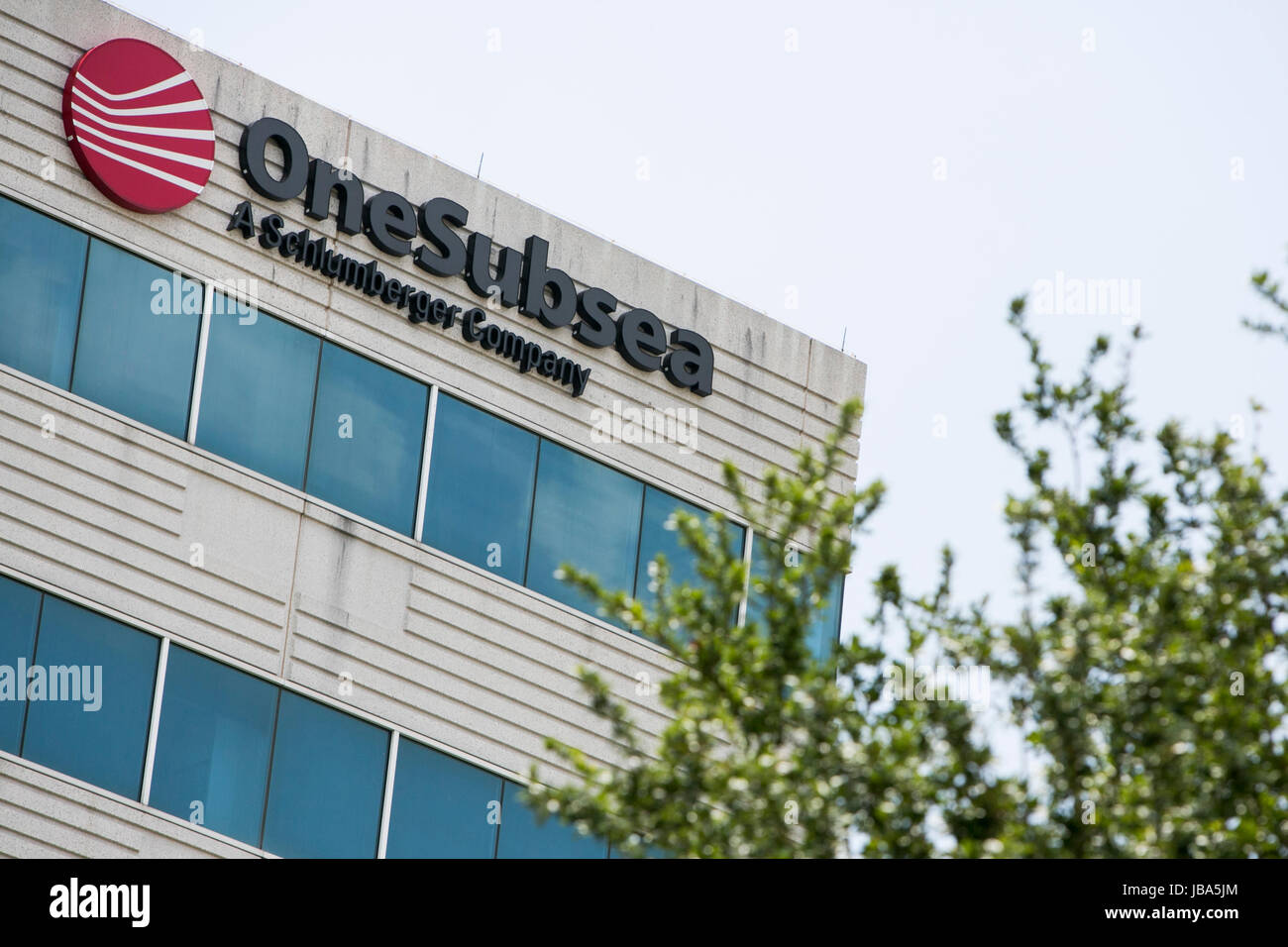 A logo sign outside of the headquarters of OneSubsea in Houston, Texas ...
