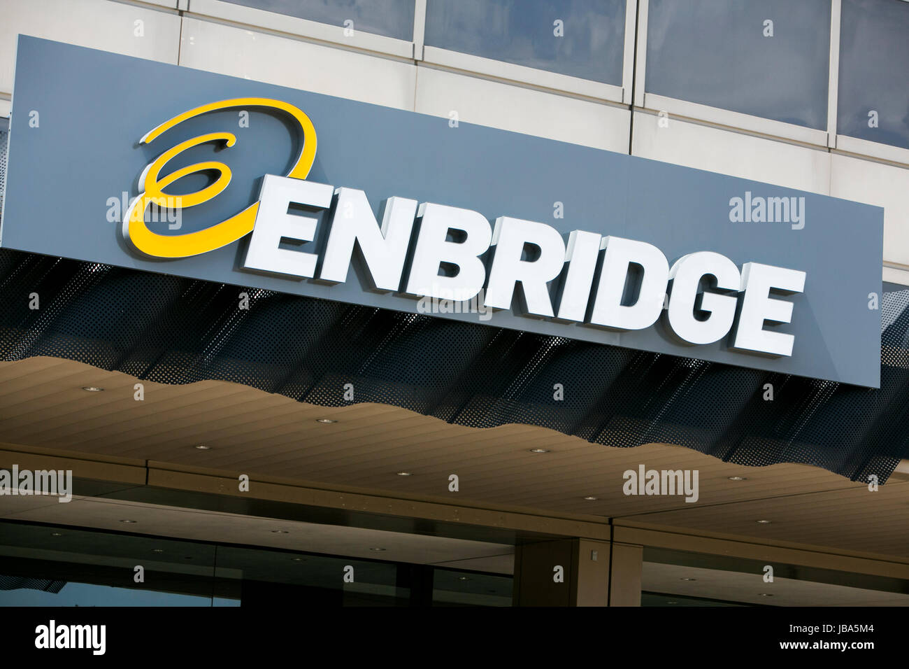 A logo sign outside of a facility occupied by Enbridge, Inc., in ...