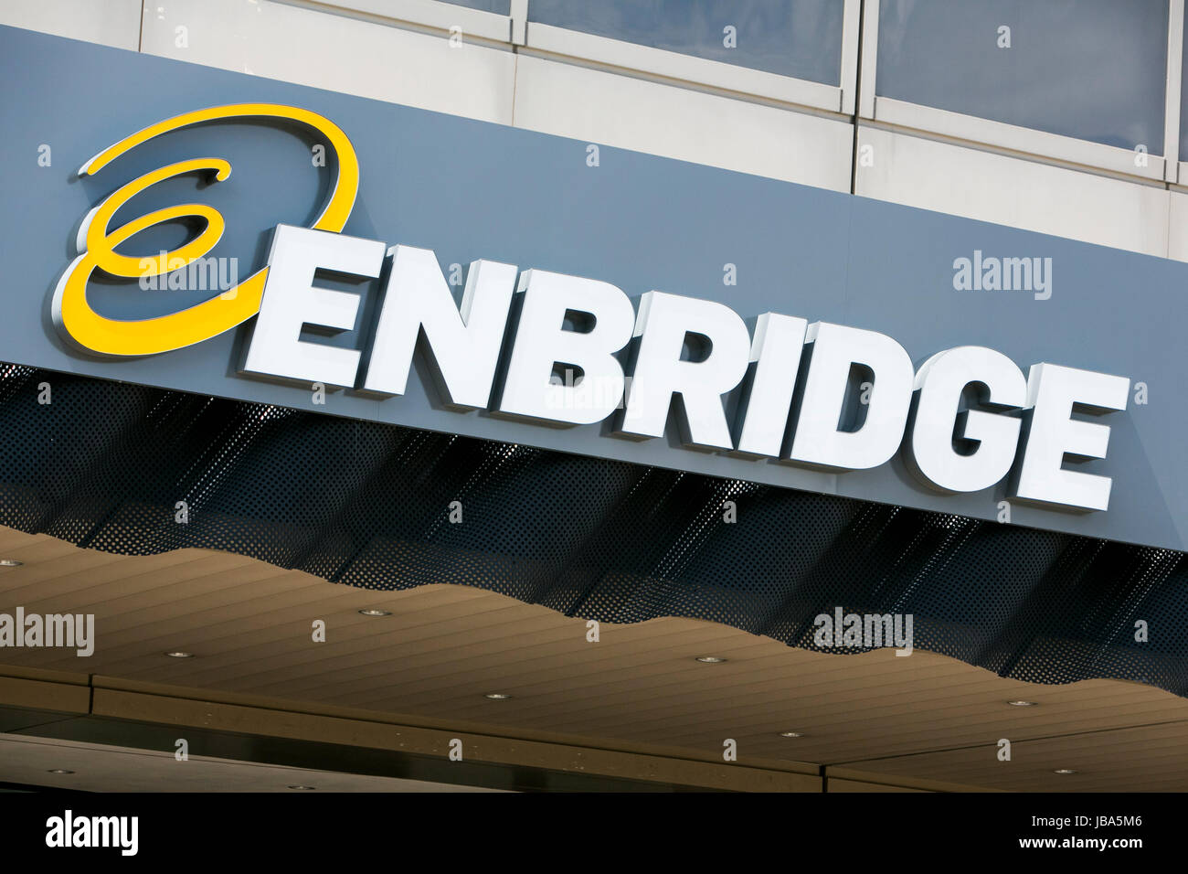 A logo sign outside of a facility occupied by Enbridge, Inc., in ...