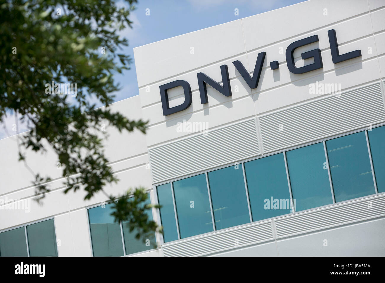 A logo sign outside of a facility occupied by DNV GL in Katy, Texas, on ...