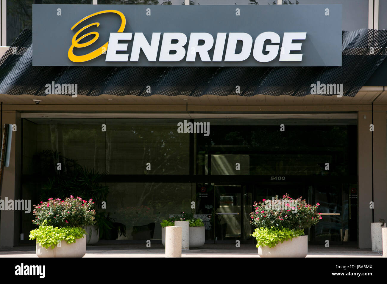A logo sign outside of a facility occupied by Enbridge, Inc., in ...