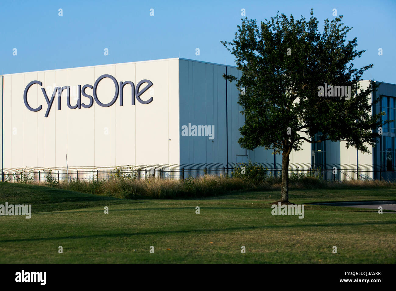A logo sign outside of a CyrusOne data center in Houston, Texas, on May ...