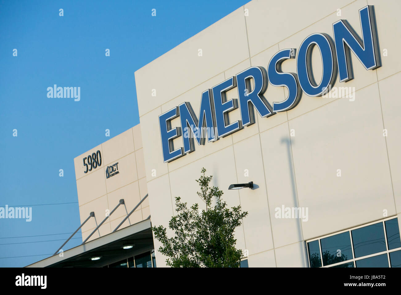 A logo sign outside of a facility occupied by The Emerson Electric ...