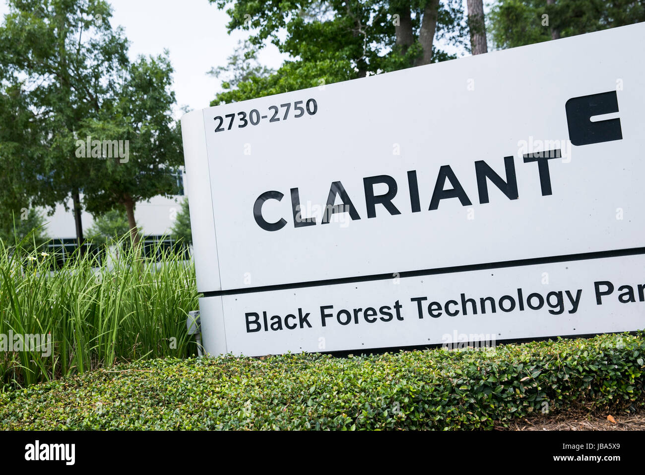 A logo sign outside of a facility occupied by Clariant in The Woodlands ...