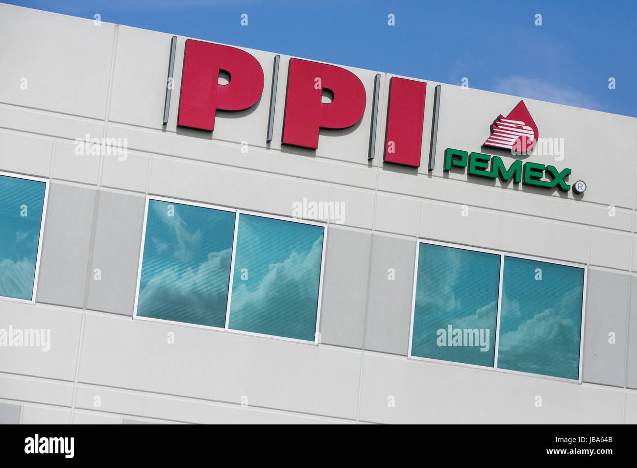 A logo sign outside of a facility occupied by PEMEX Procurement ...