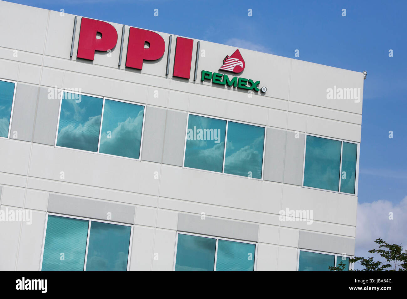 A logo sign outside of a facility occupied by PEMEX Procurement ...