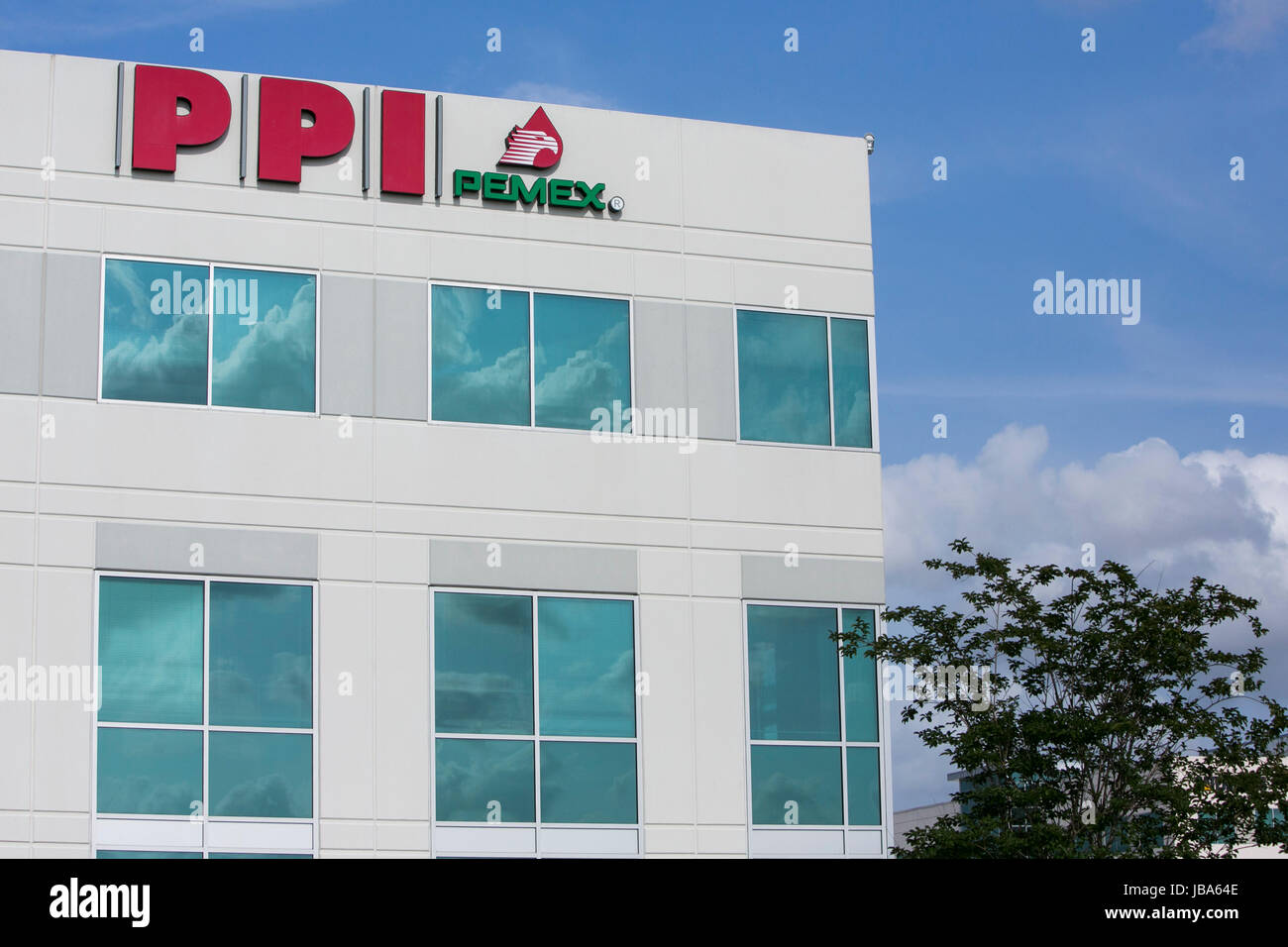 A logo sign outside of a facility occupied by PEMEX Procurement ...