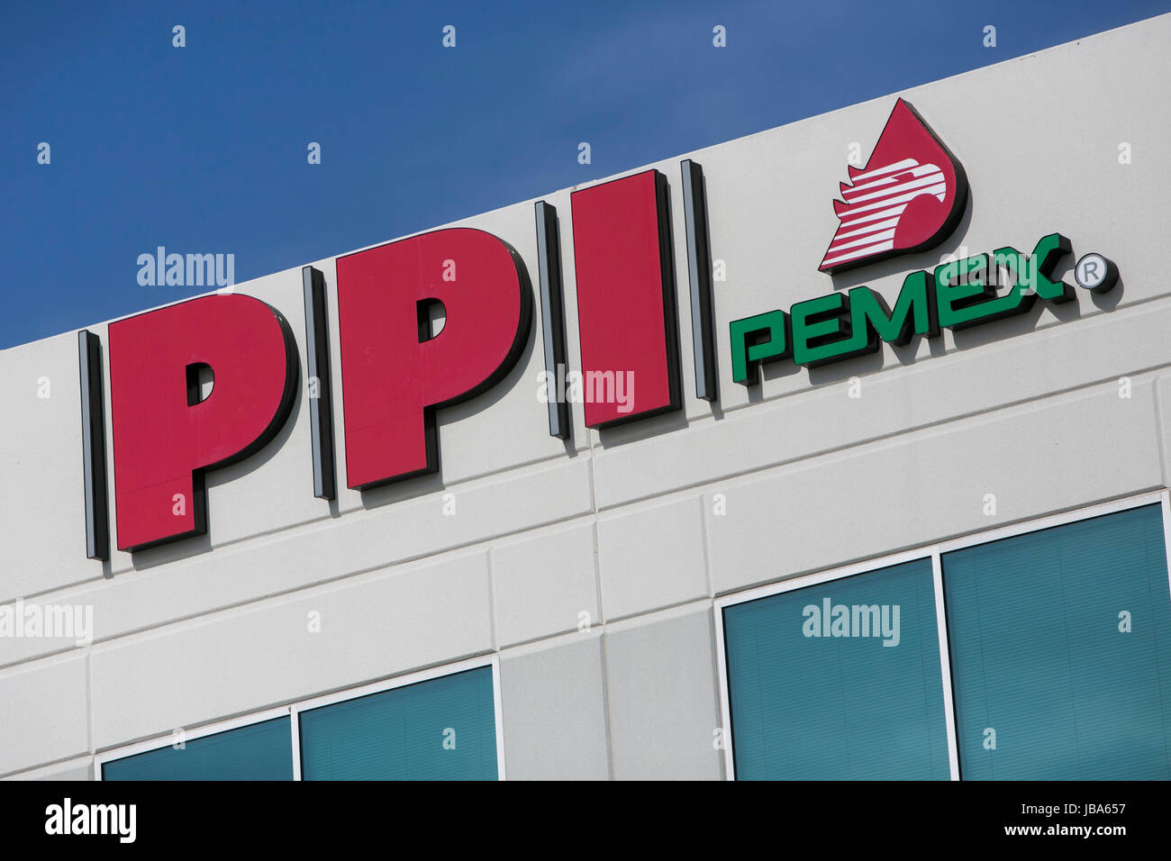 A logo sign outside of a facility occupied by PEMEX Procurement ...