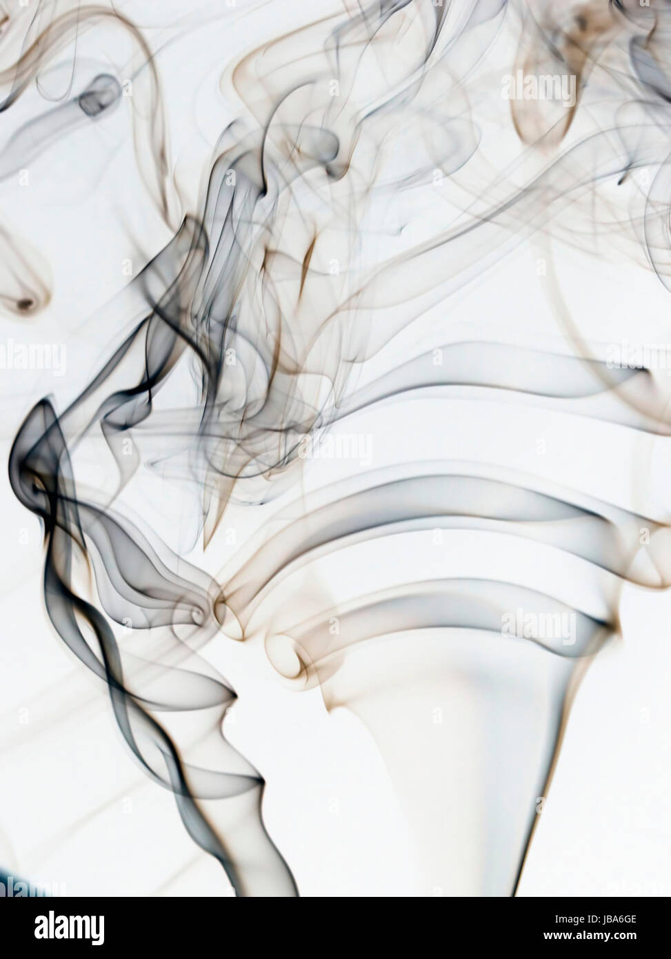 Abstract different colored smoke isolated on white Stock Photo - Alamy