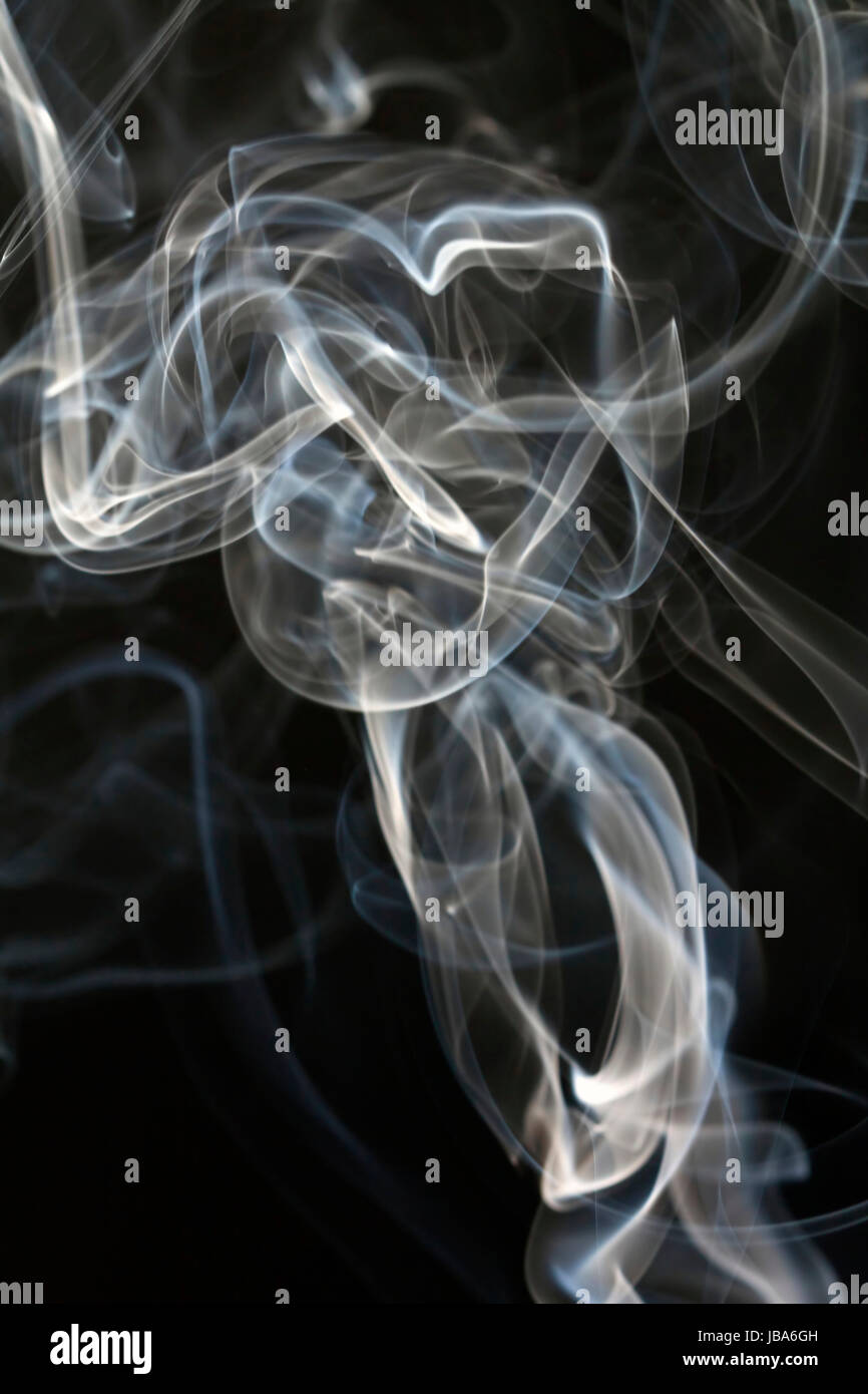 Abstract light smoke isolated on black Stock Photo - Alamy