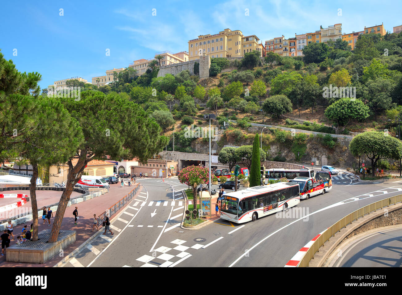 MONTE CARLO, MONACO - JULY 13: Street with pedestrians, urban road with ...