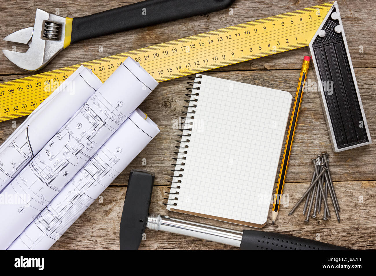 Twisted technical drawing and tools with blank notebook for your text ...