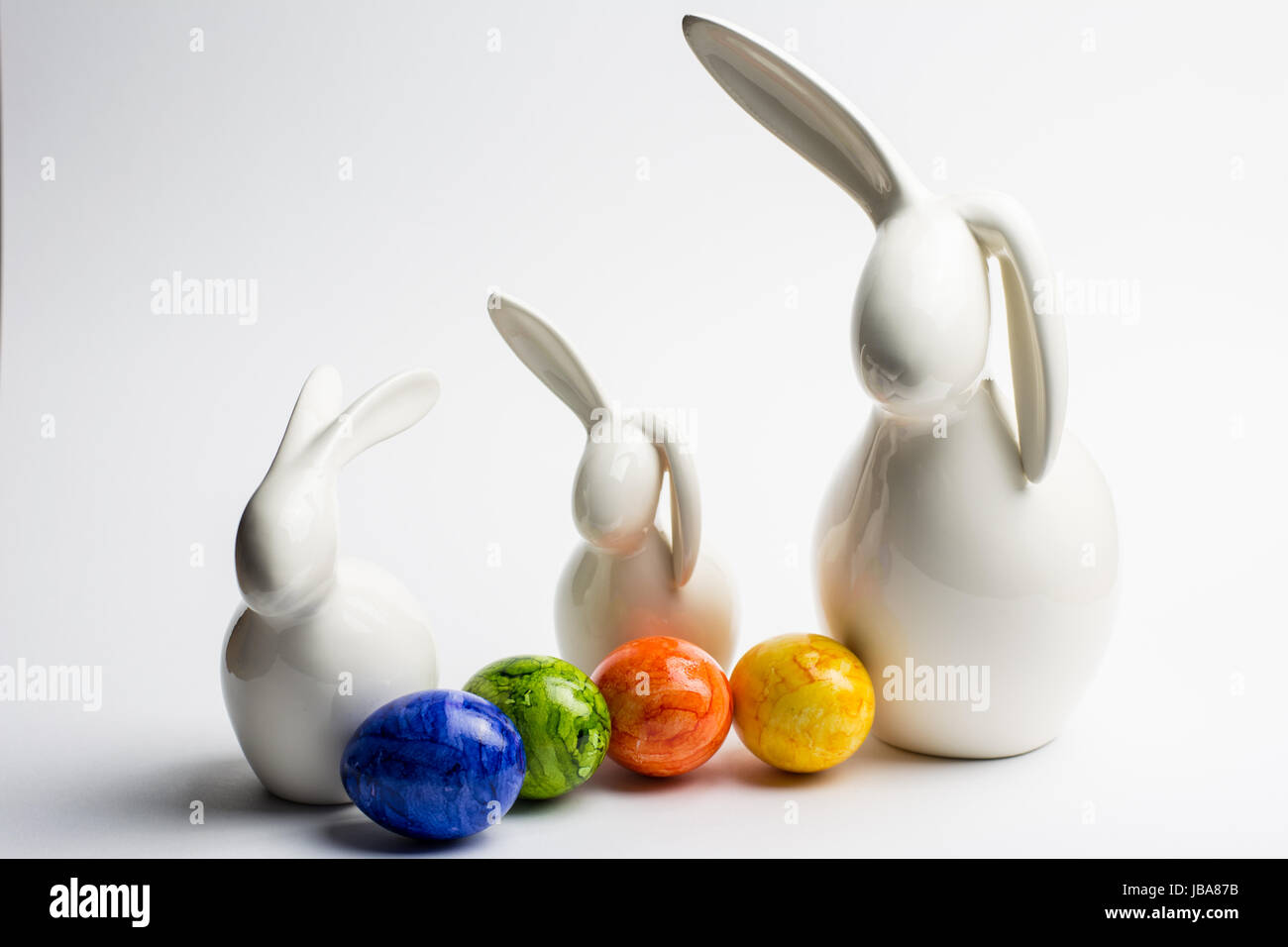 3 easter bunny with eggs Stock Photo - Alamy
