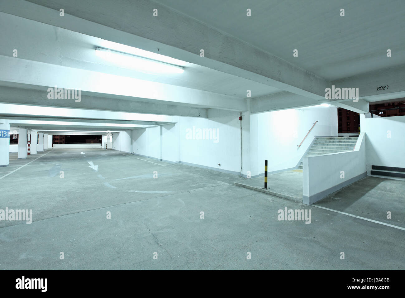 Interior of empty parking lot at Stock Photo - Alamy