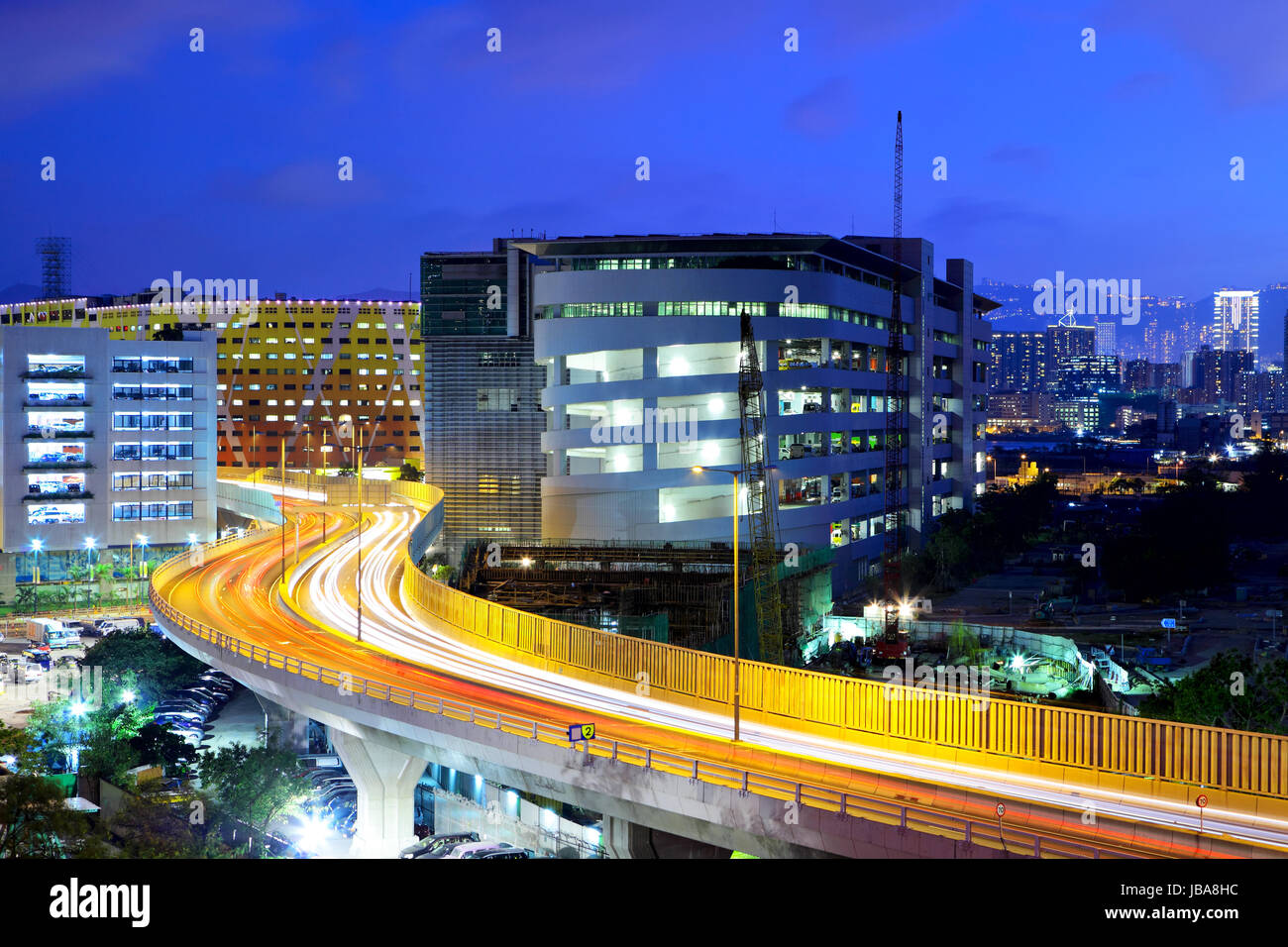 Highway pass through city Stock Photo - Alamy