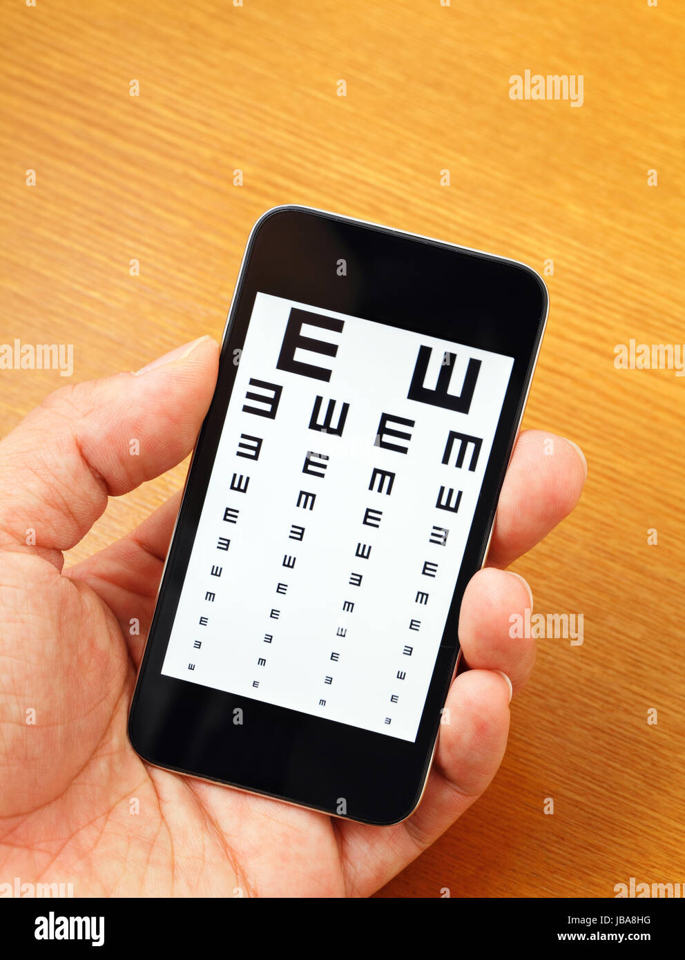 Eyechart on mobile Stock Photo - Alamy