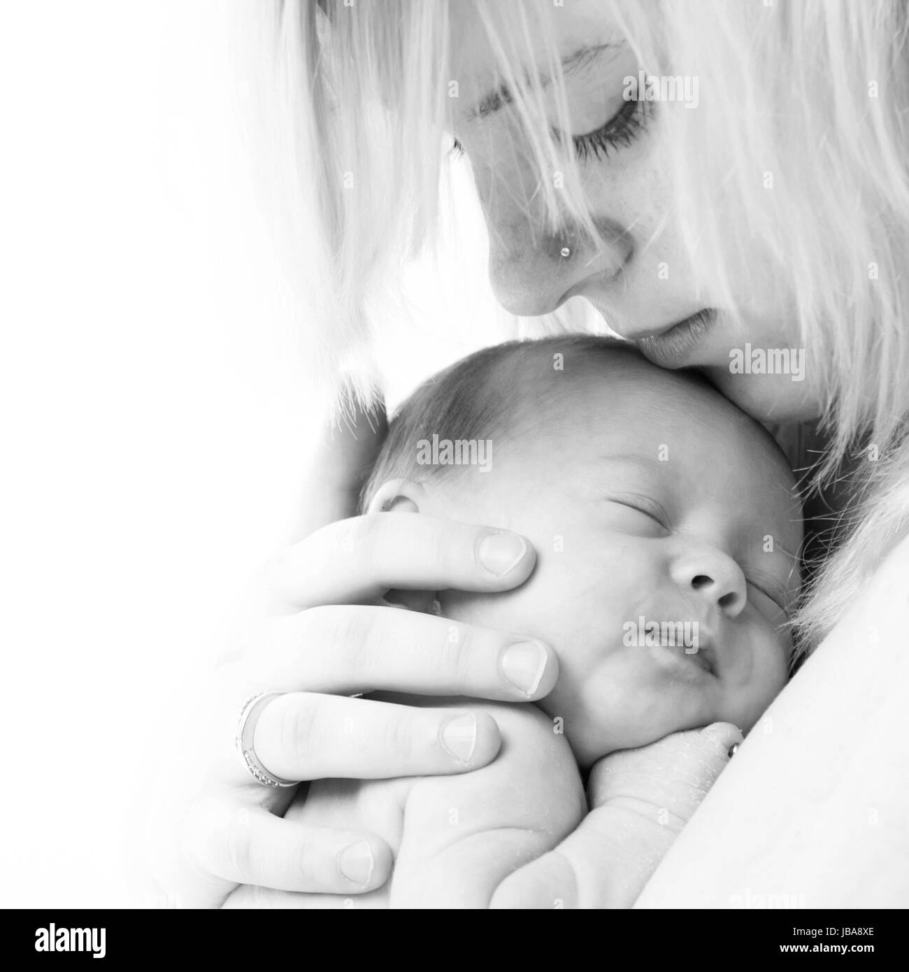 happy newborn baby girl just a week old photographed in the studio ...