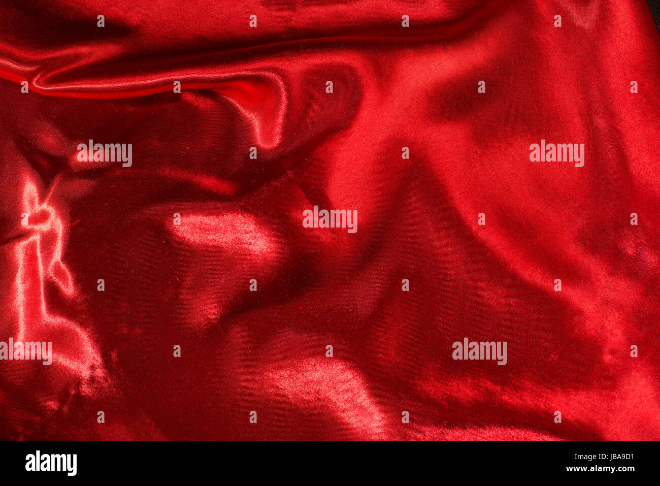 Shiny red satin pleated fabric background. Close up Stock Photo - Alamy