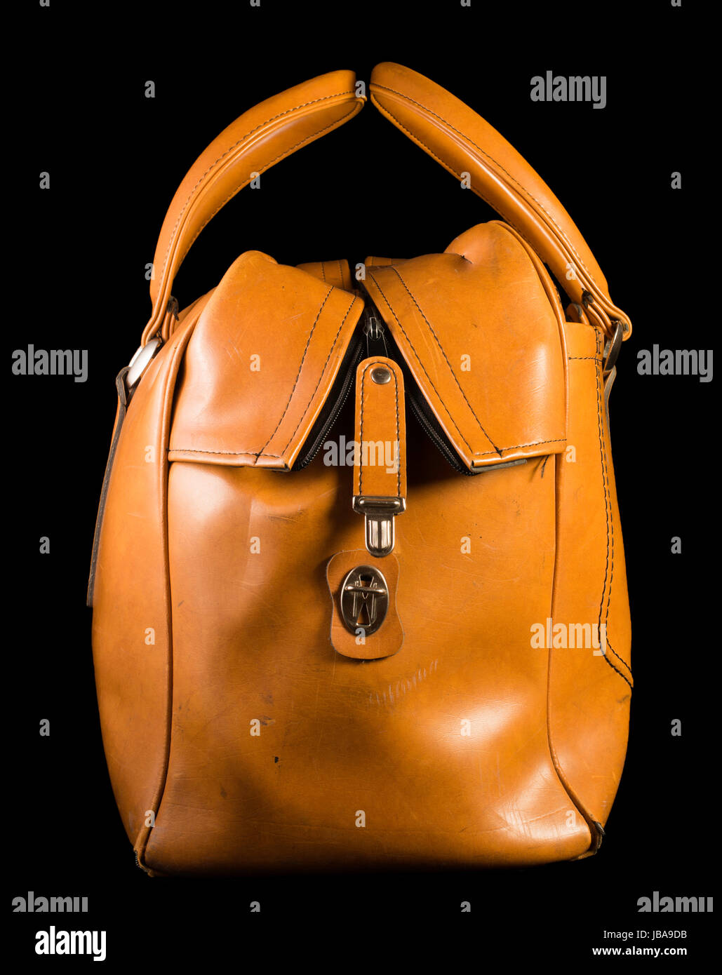 Old vintage luggage brown bag. Black isolated Stock Photo - Alamy