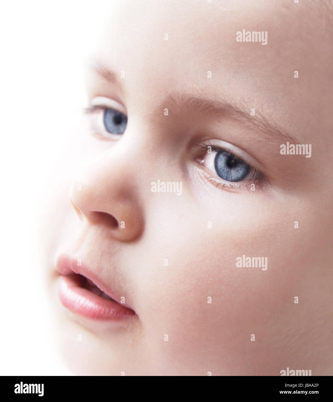 Little cute girl's face close up on a white background Stock Photo - Alamy