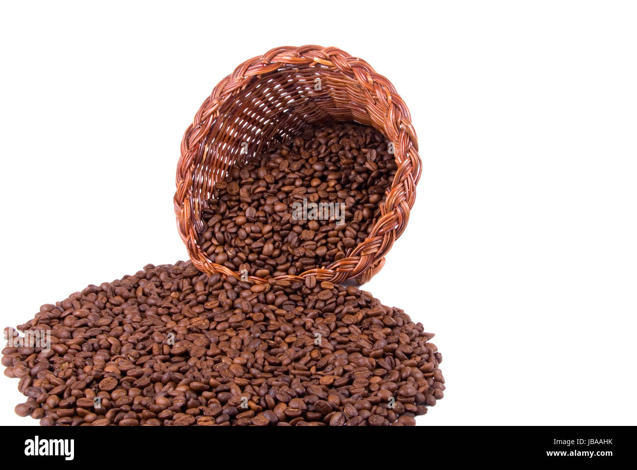 A wicker cornucopia full of coffee beans Stock Photo - Alamy