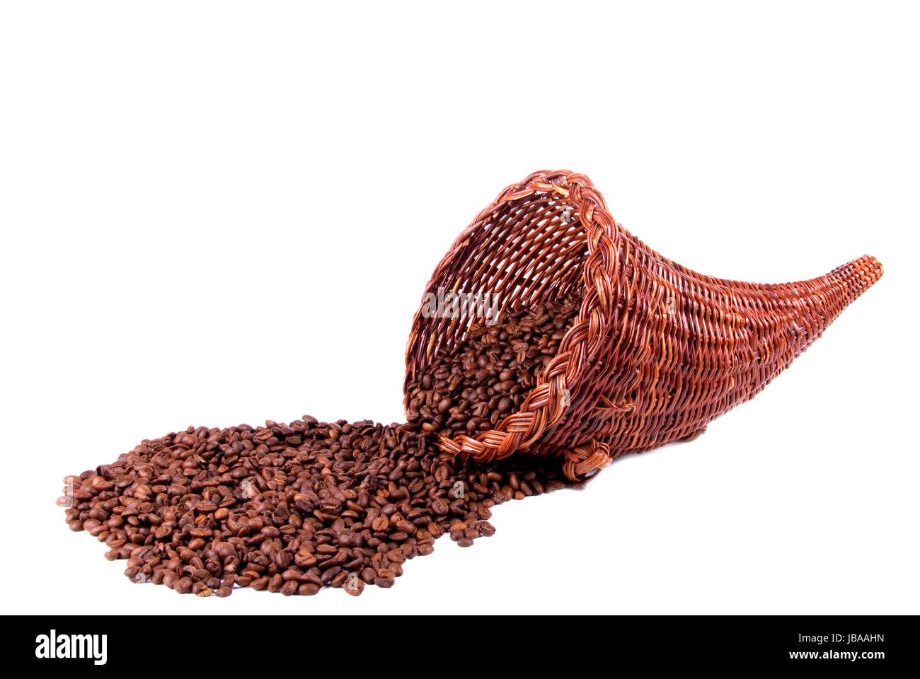 A wicker cornucopia full of coffee beans Stock Photo - Alamy